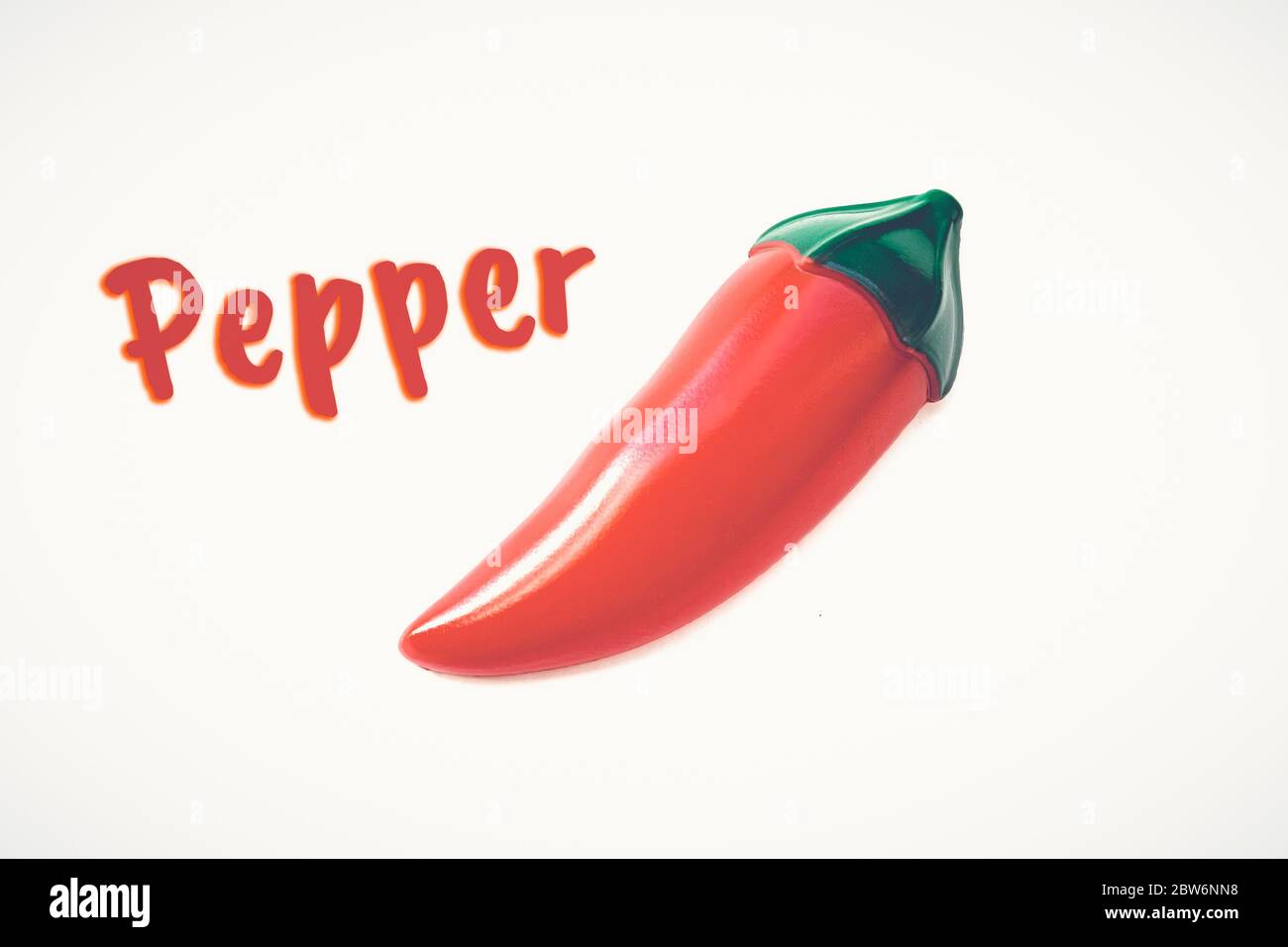 Pepper. Toy plastic vegetable isolated on white background. Plastic ...