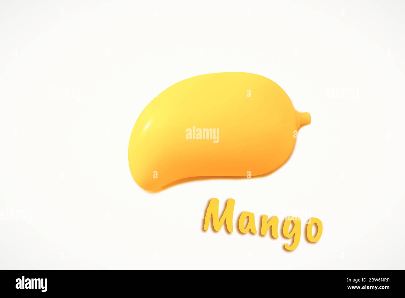 Mango. Toy plastic fruit isolated on white background. Plastic fruit ...
