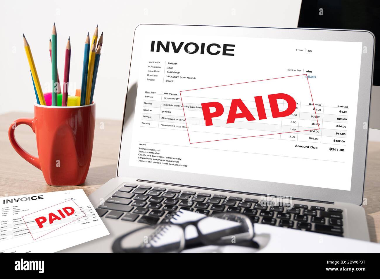 Businessman work Using The Computer Calculating Invoice In Office ...