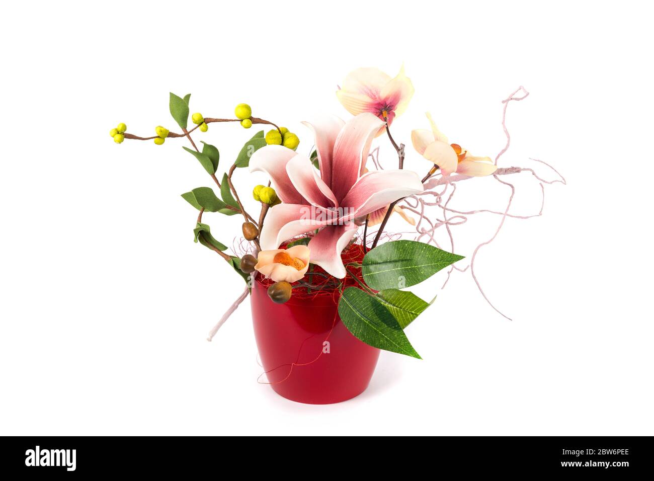 Composition with artificial flowers in a pot isolated on white ...