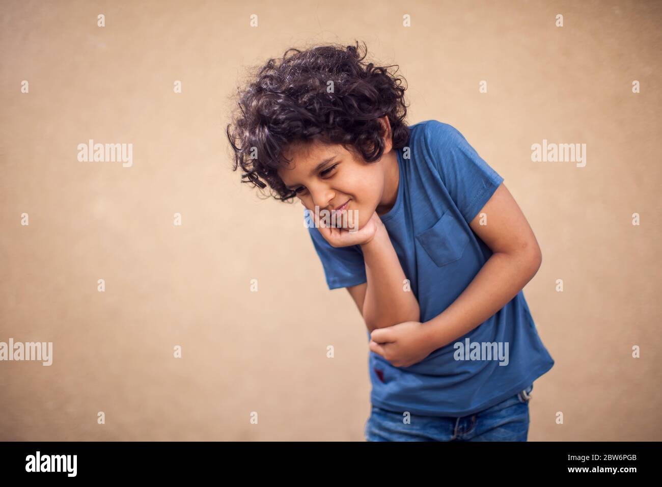Kid boy feels strong tooth pain. Children, healthcare and medicine ...