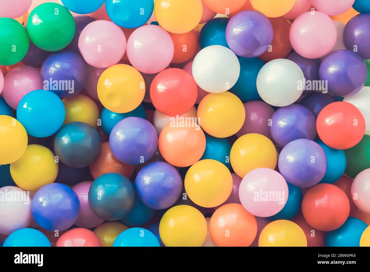Multi-colored designer background. Many colorful balls for fun and ...
