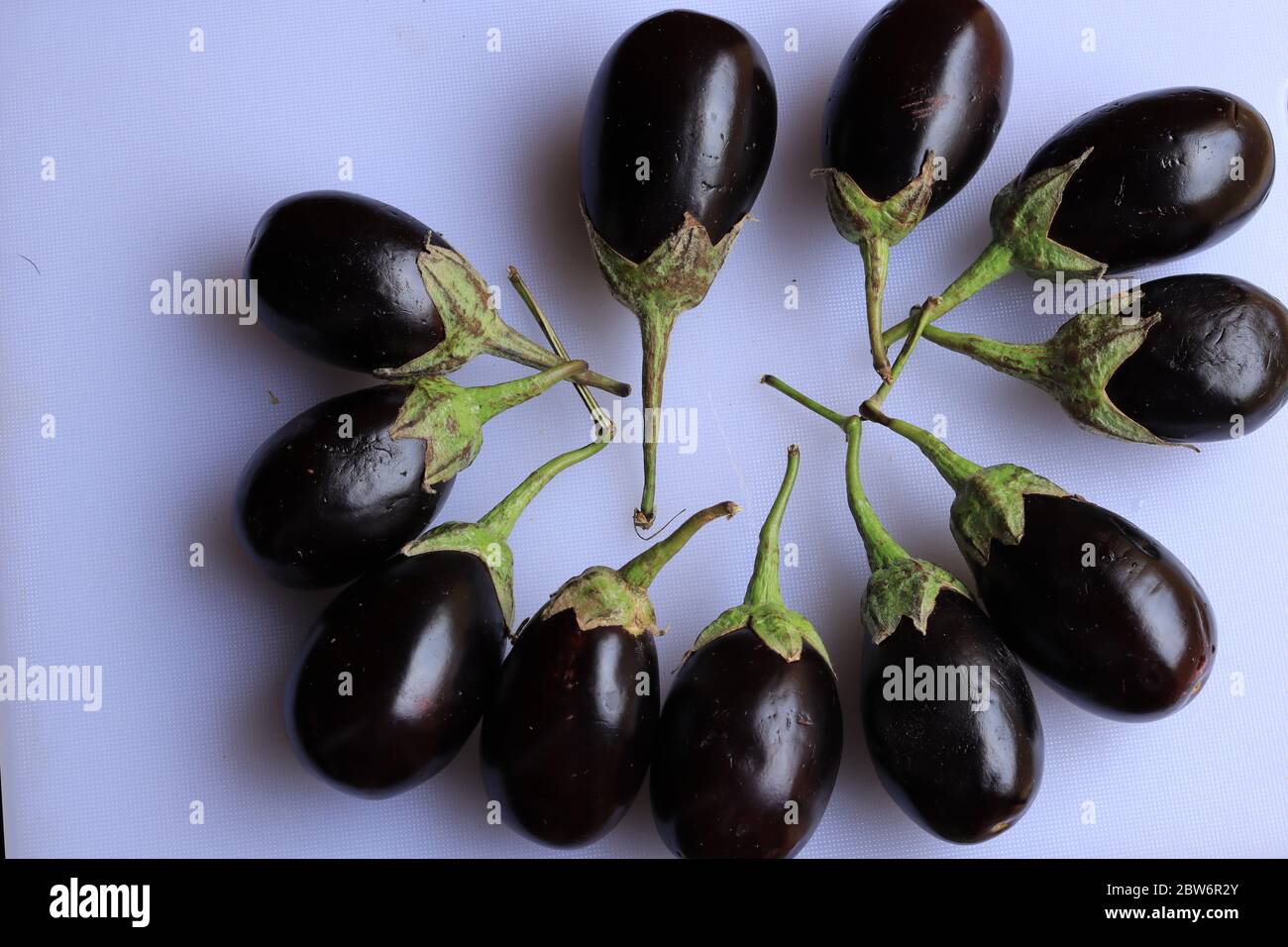 Fresh Raw Sliced Purple Eggplant Brinjal or Eggplant isolated on white ...
