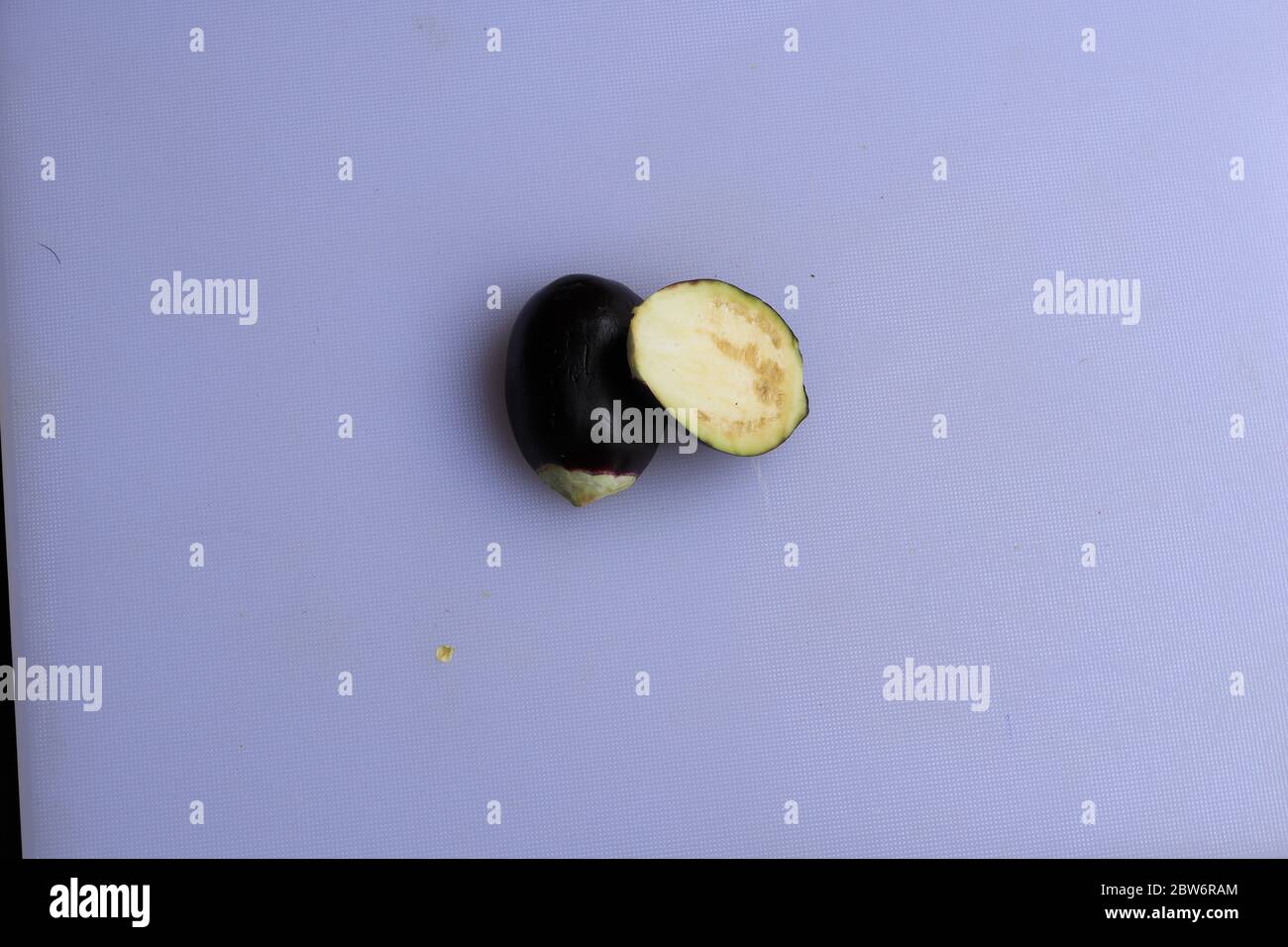 Fresh Raw Sliced Purple Eggplant Brinjal or Eggplant isolated on white ...