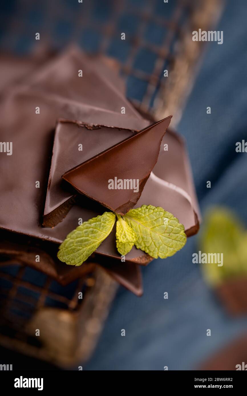 dark or milk chocolate bars with green mint leaf Stock Photo - Alamy