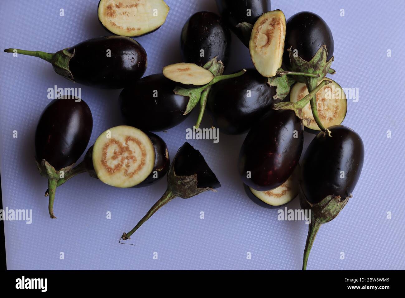 Fresh Raw Sliced Purple Eggplant Brinjal or Eggplant isolated on white ...