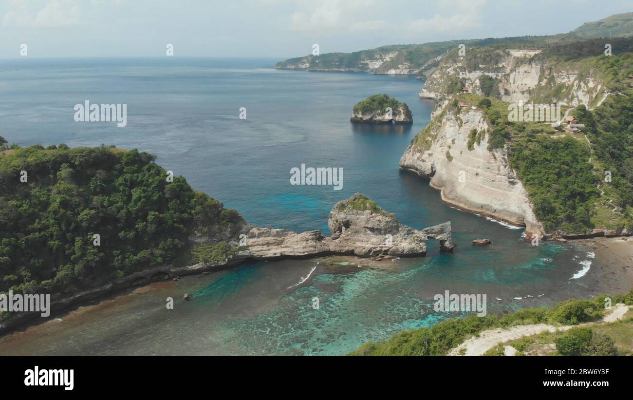 Aerial view of the small island of Nusa Penida Island from the Atuh ...