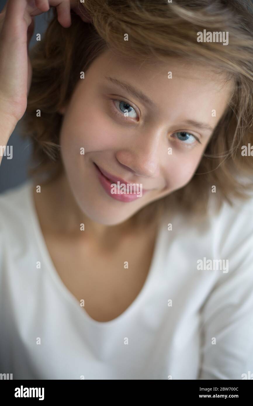 Portrait of beautiful smiling lady dreamily looking in camera Stock ...