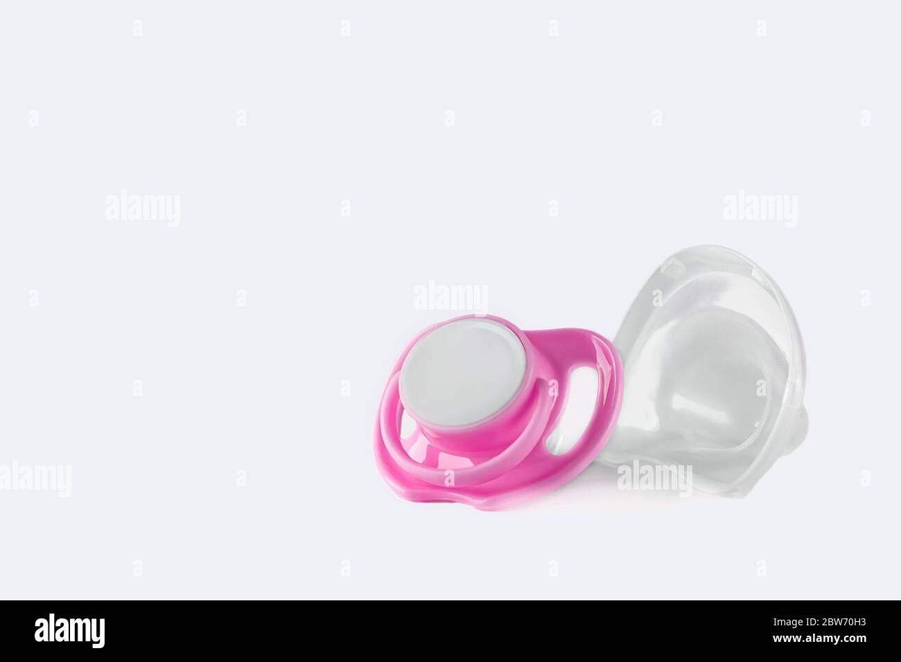 Pink baby's pacifier isolated on white background. Copy space Stock ...