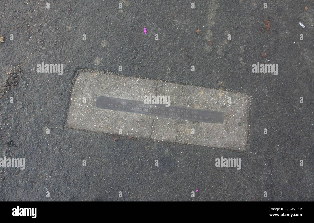 Meridian sign on pavement in Somersham. Huntingdon, UK Stock Photo - Alamy