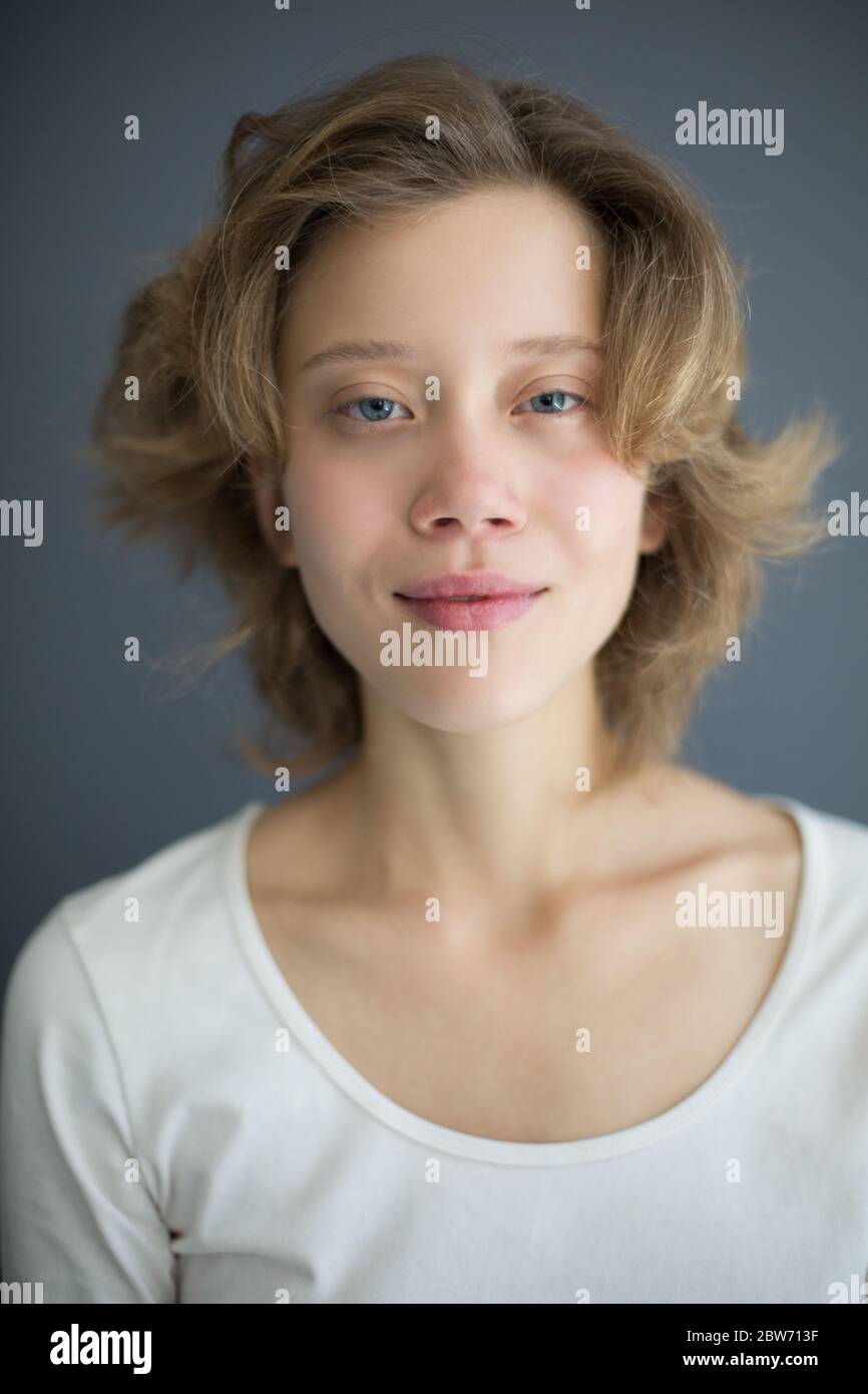 Sensual beautiful woman dreamily looking in camera Stock Photo - Alamy