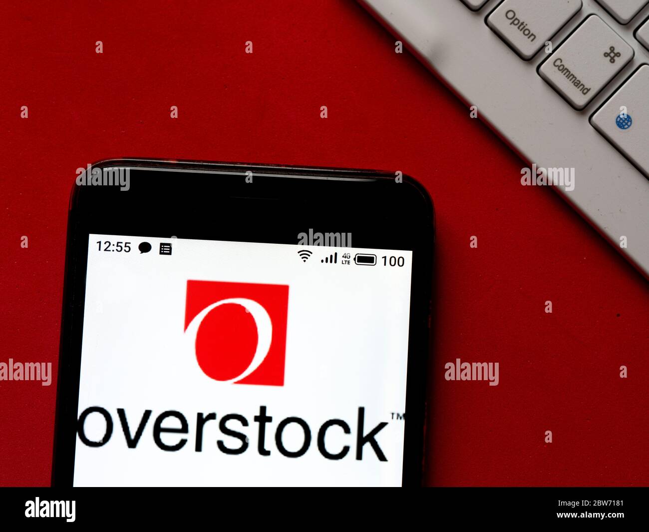 In this photo illustration e-commerce Overstock logo is seen displayed ...