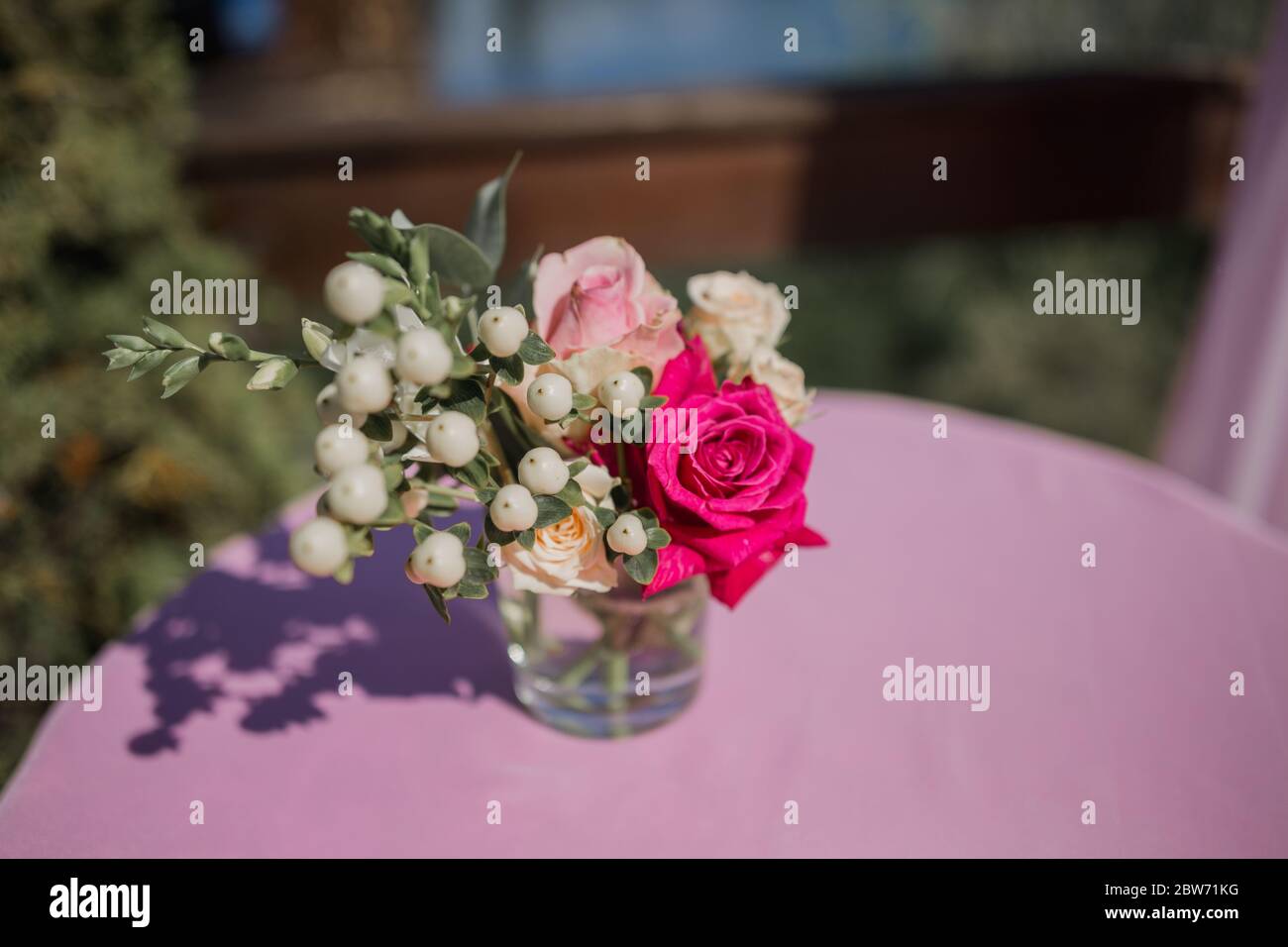 bouquet of flowers on a table in a restaurant Stock Photo - Alamy