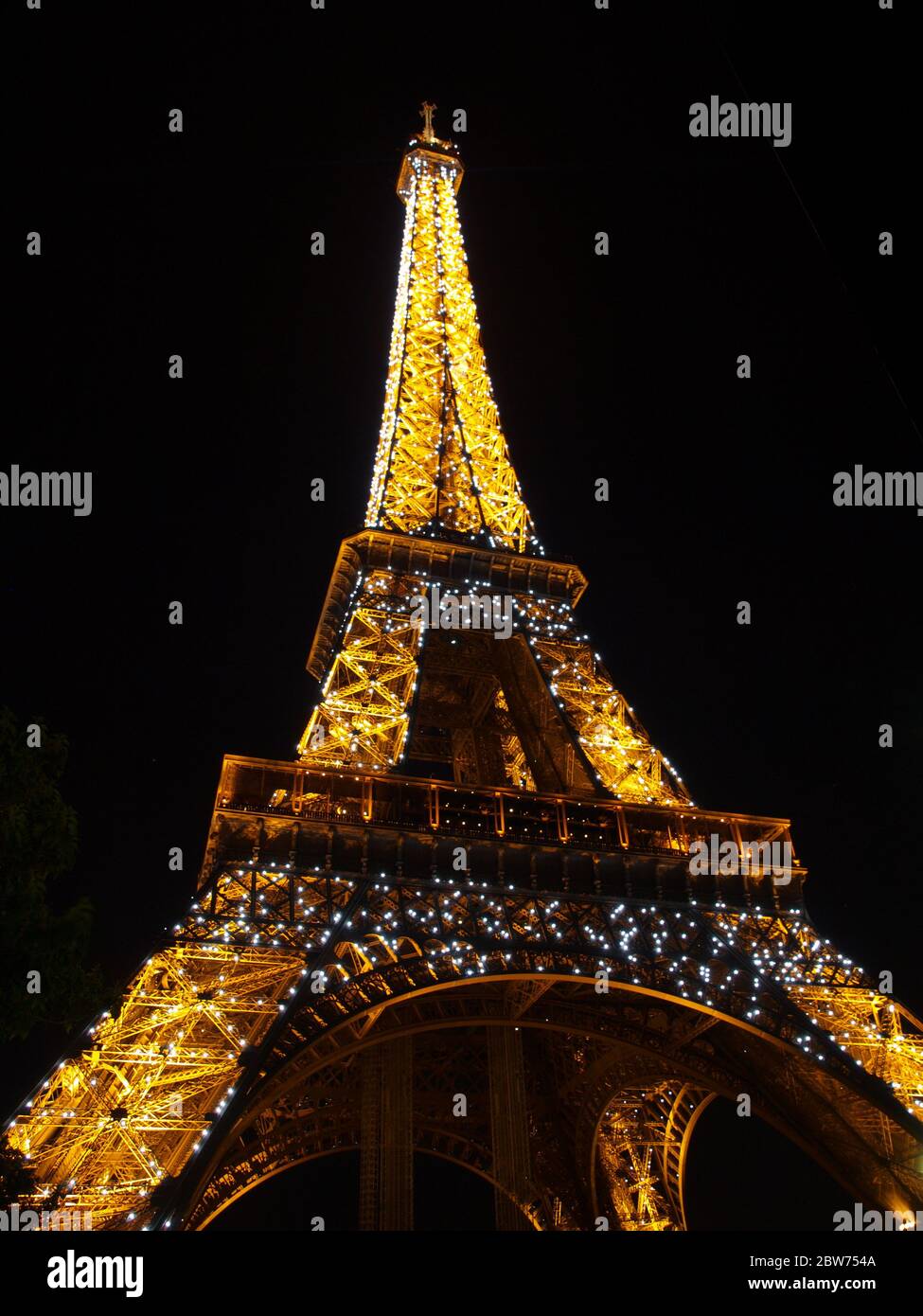 Eiffel Tower, Paris illuminated at night Stock Photo - Alamy