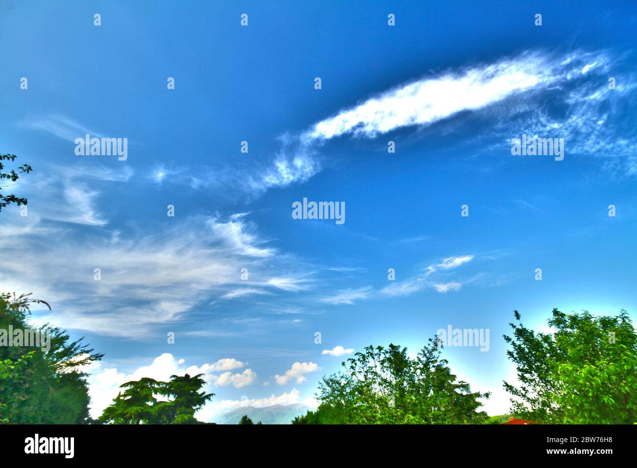 Panorama blue high dynamic range sky with clouds Stock Photo - Alamy