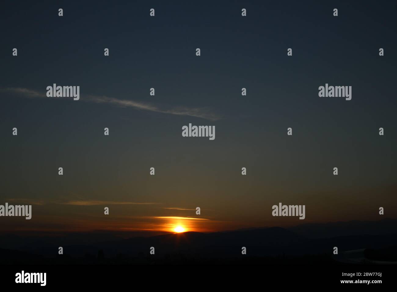 sunset, sunrise gold red pink sky landscape Stock Photo - Alamy