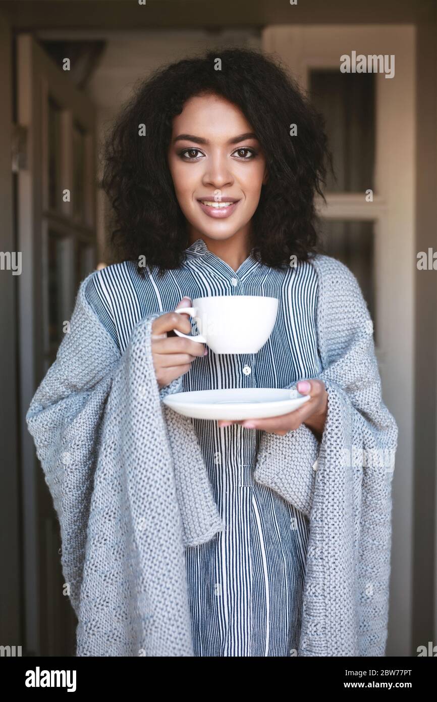 Cute girl wrapped in plaid hi-res stock photography and images - Alamy