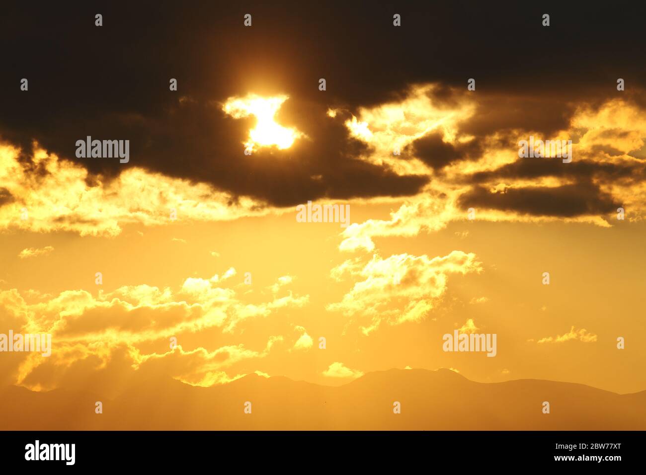sunset, sunrise gold red pink sky landscape Stock Photo - Alamy