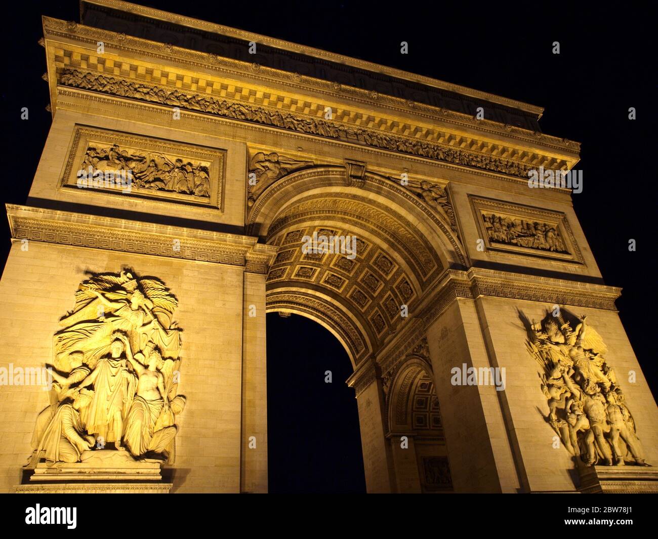 Arc de Triomphe, Paris illuminated at night Stock Photo - Alamy