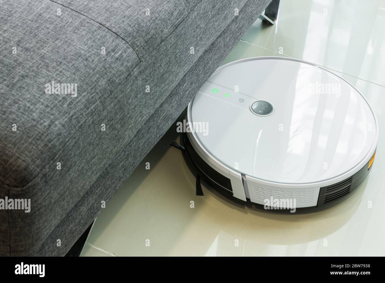 Robot vacuum cleaner and furniture hi-res stock photography and images ...