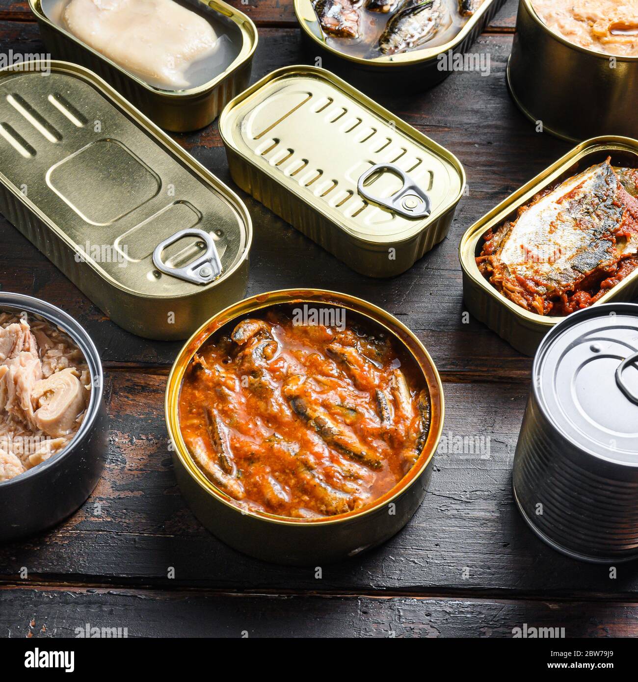Conserves of canned fish with different types of seafood, opened and ...