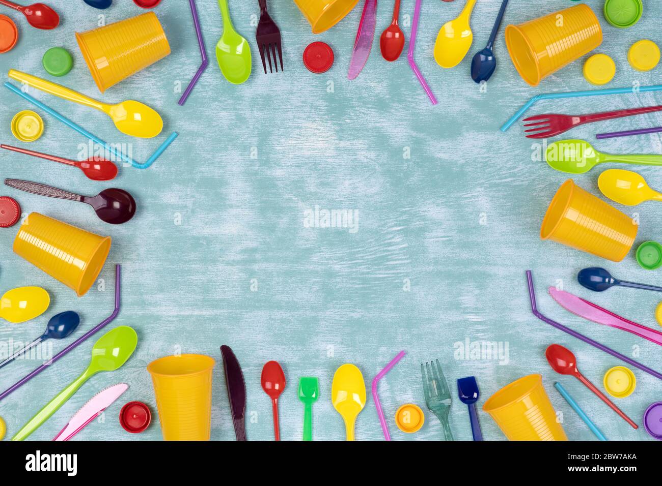 Disposable single use plastic objects such as cups, forks and spoons ...