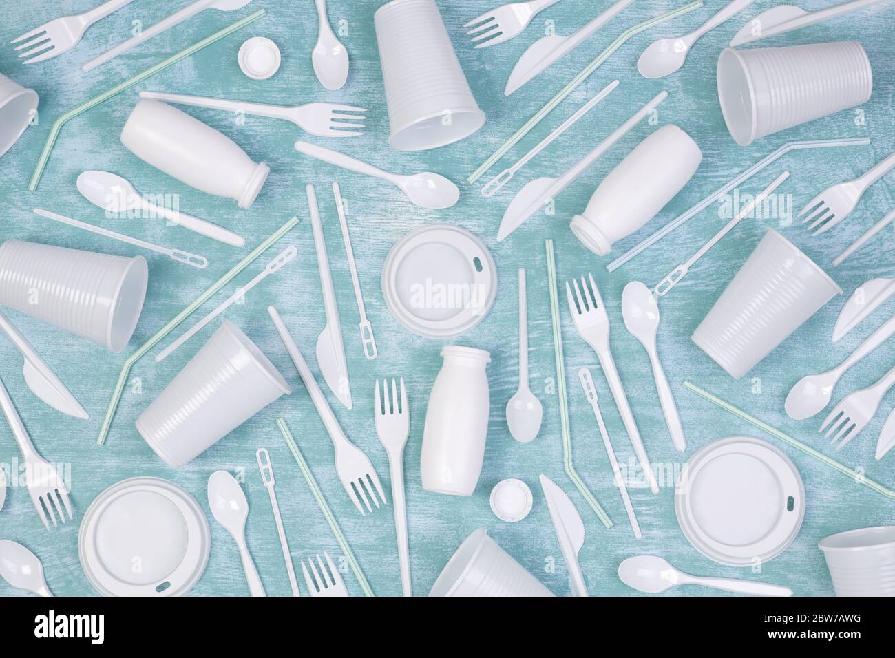 Disposable white single use plastic objects such as bottles, cups ...