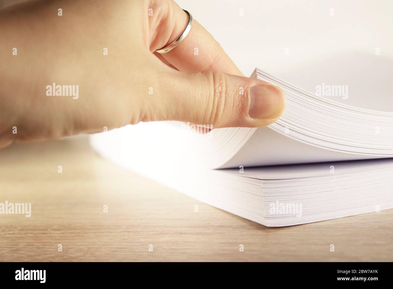 Stack of paper on office desk for report papers . Close up of stack ...