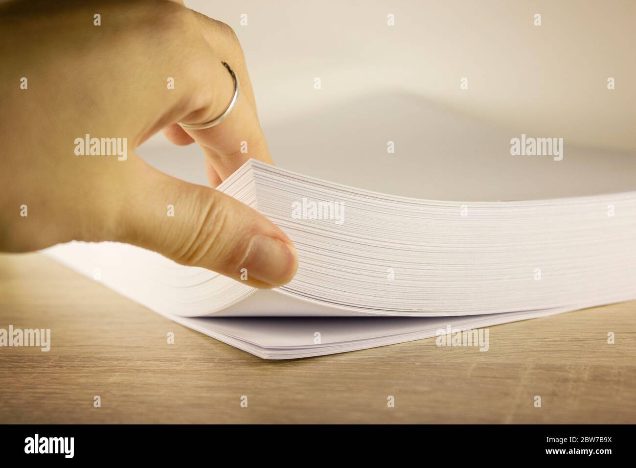 Stack of paper on office desk for report papers . Close up of stack ...
