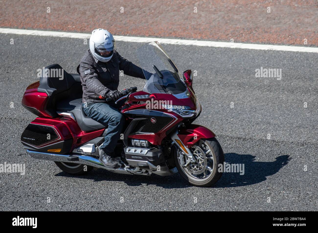 Red Honda Goldwing; Motorbike rider; two-wheeled transport, motorcycles ...
