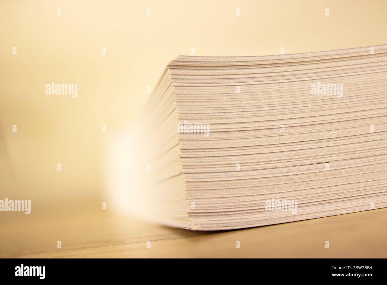 Close up of stack of papers on white background. Office: Pile of Paper ...