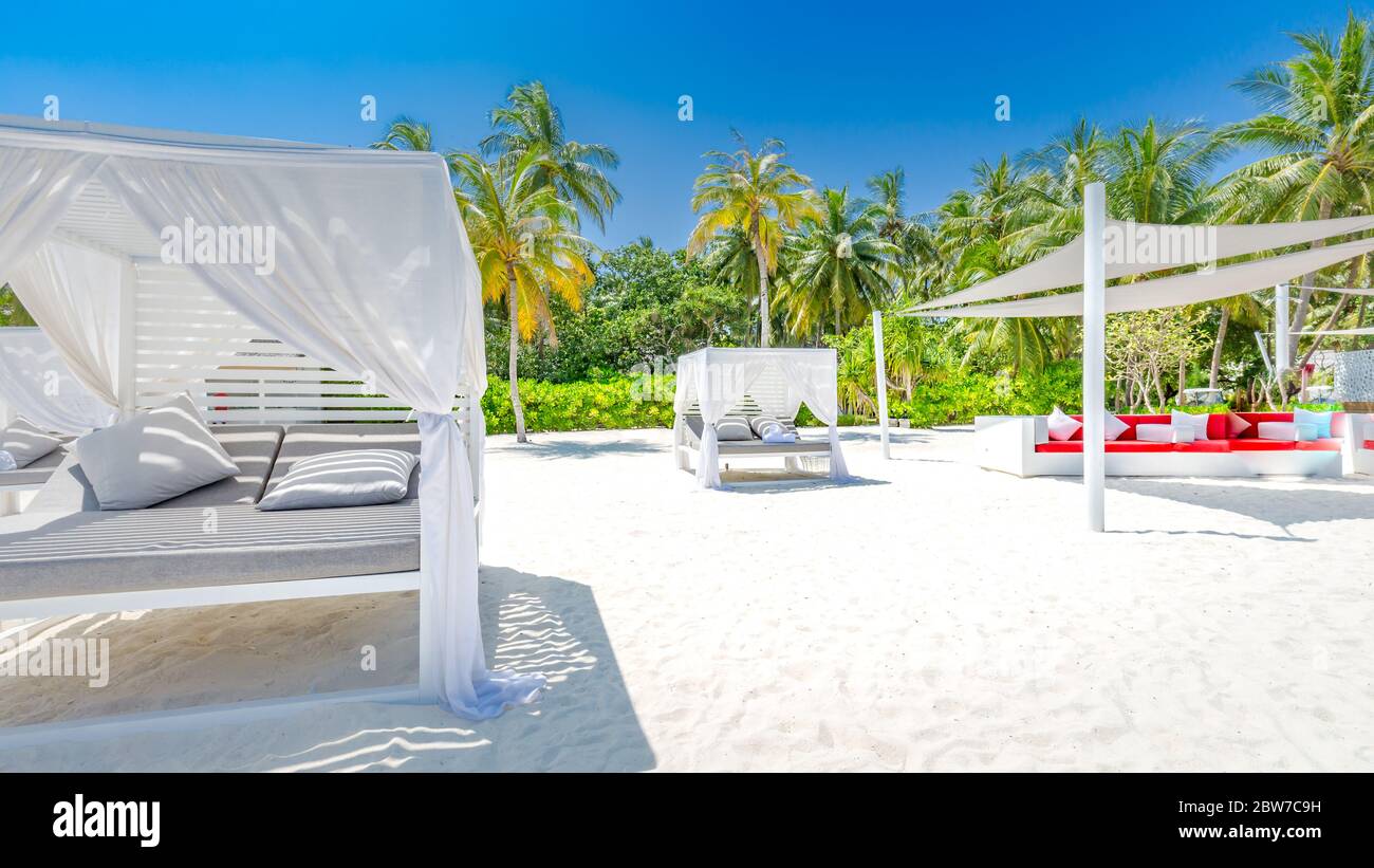Canopy on exotic beach scene. White beach canopies. Luxury beach tents ...