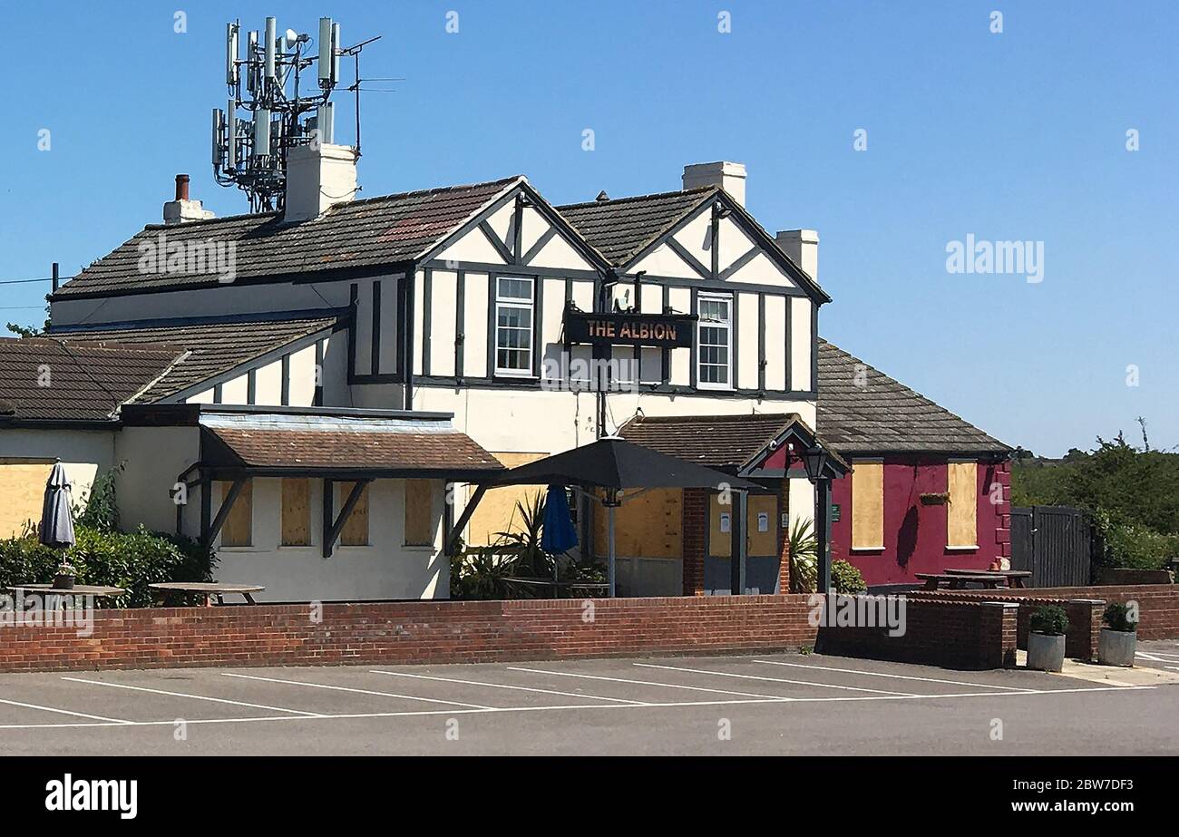 RAINHAM, UK MAY 30: Albion public House all boarded up during to ...