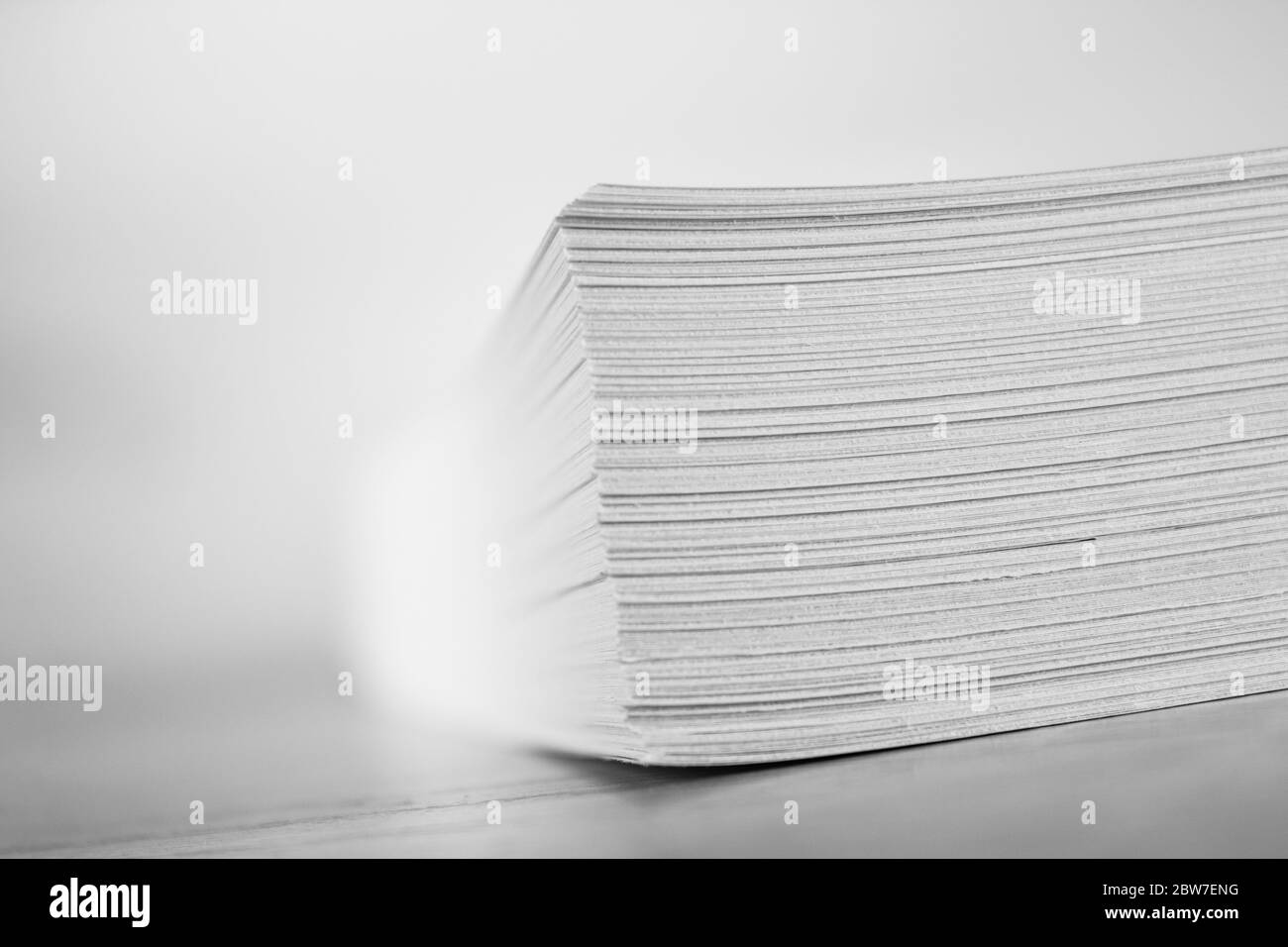 Close up of stack of papers on white background. Office: Pile of Paper ...