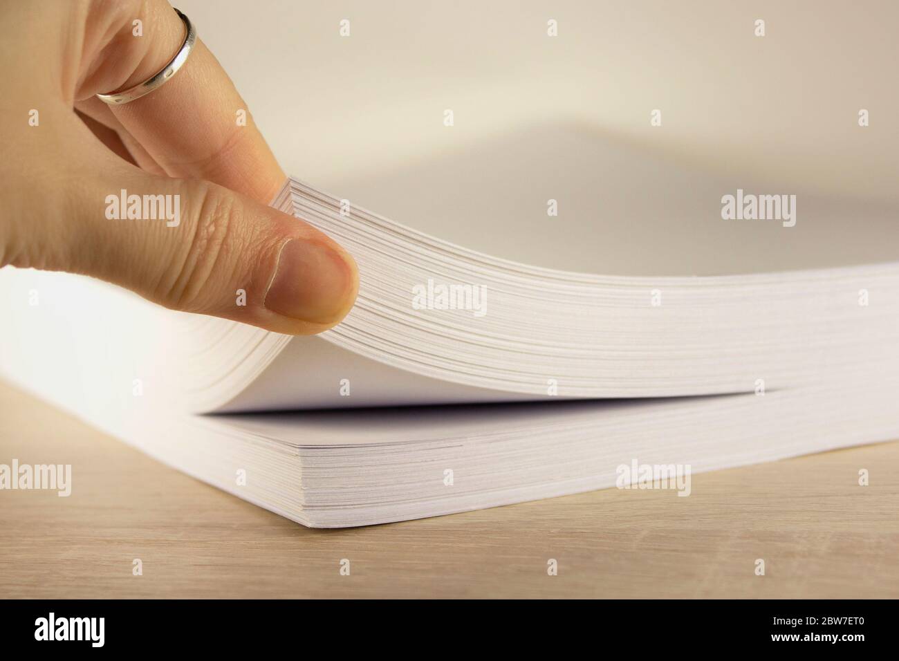 Stack of paper on office desk for report papers . Close up of stack ...