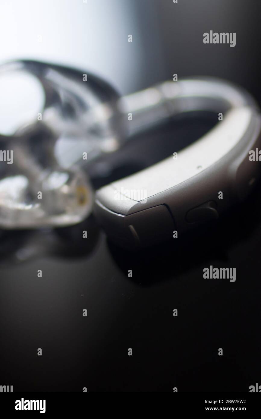 Modern digital hearing aid for deafness and deaf people Stock Photo - Alamy