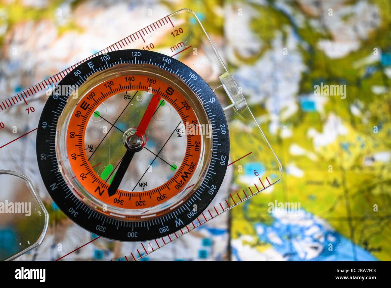 Orientation by map and compass. Symbols of expedition and travel in the ...