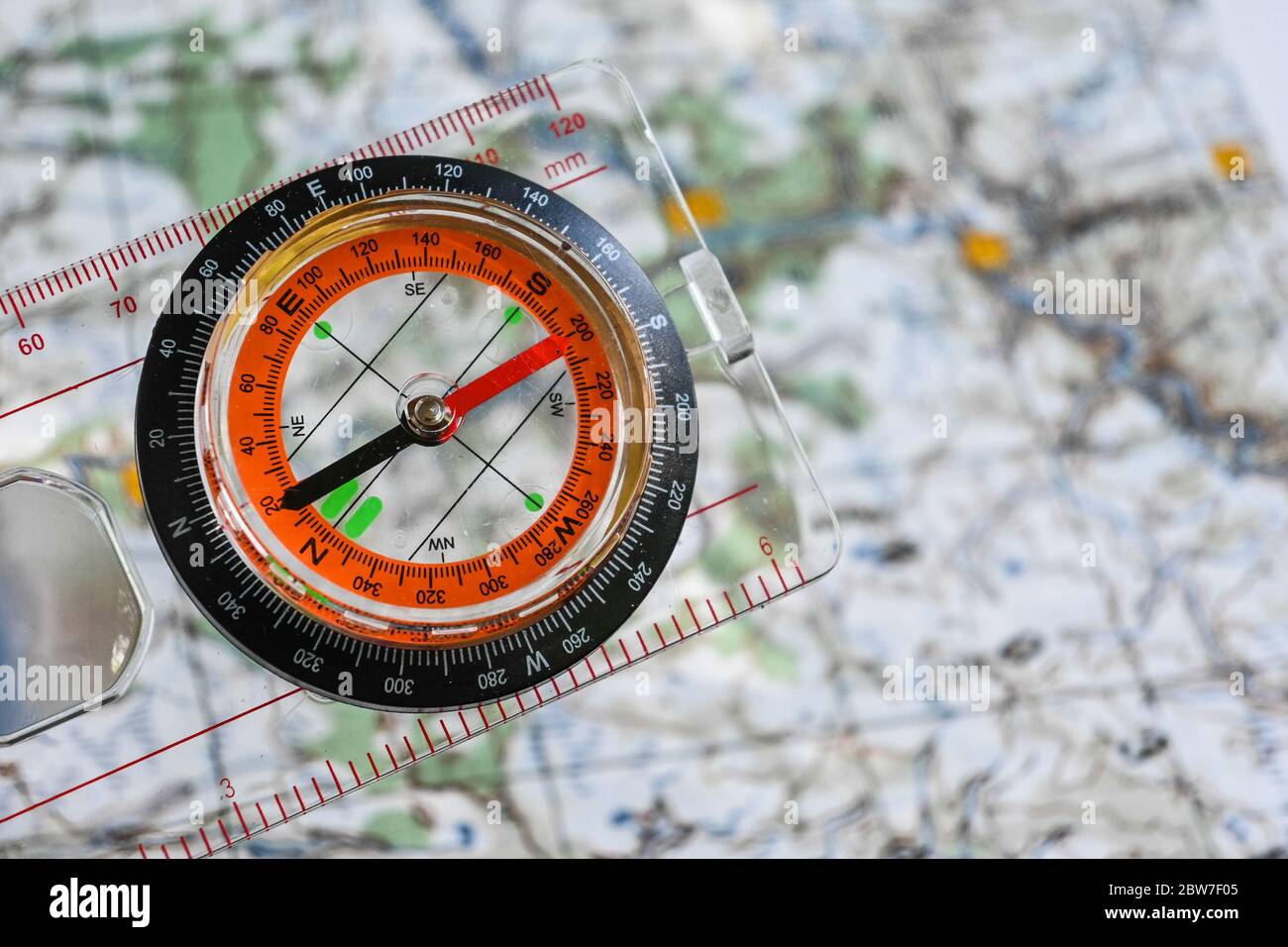Orientation by map and compass. Symbols of expedition and travel in the ...
