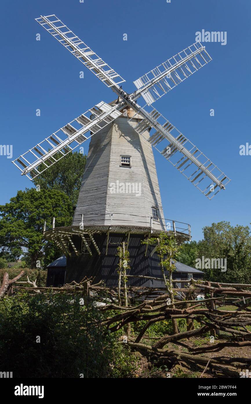 Old windmill 1879 at Shipley village near Horsham UK. White smock built ...