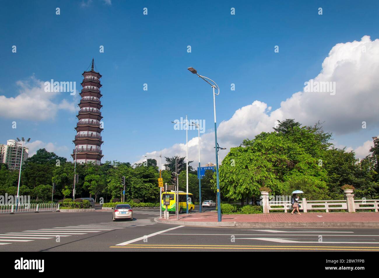 Woman walking trees architecture hi-res stock photography and images ...