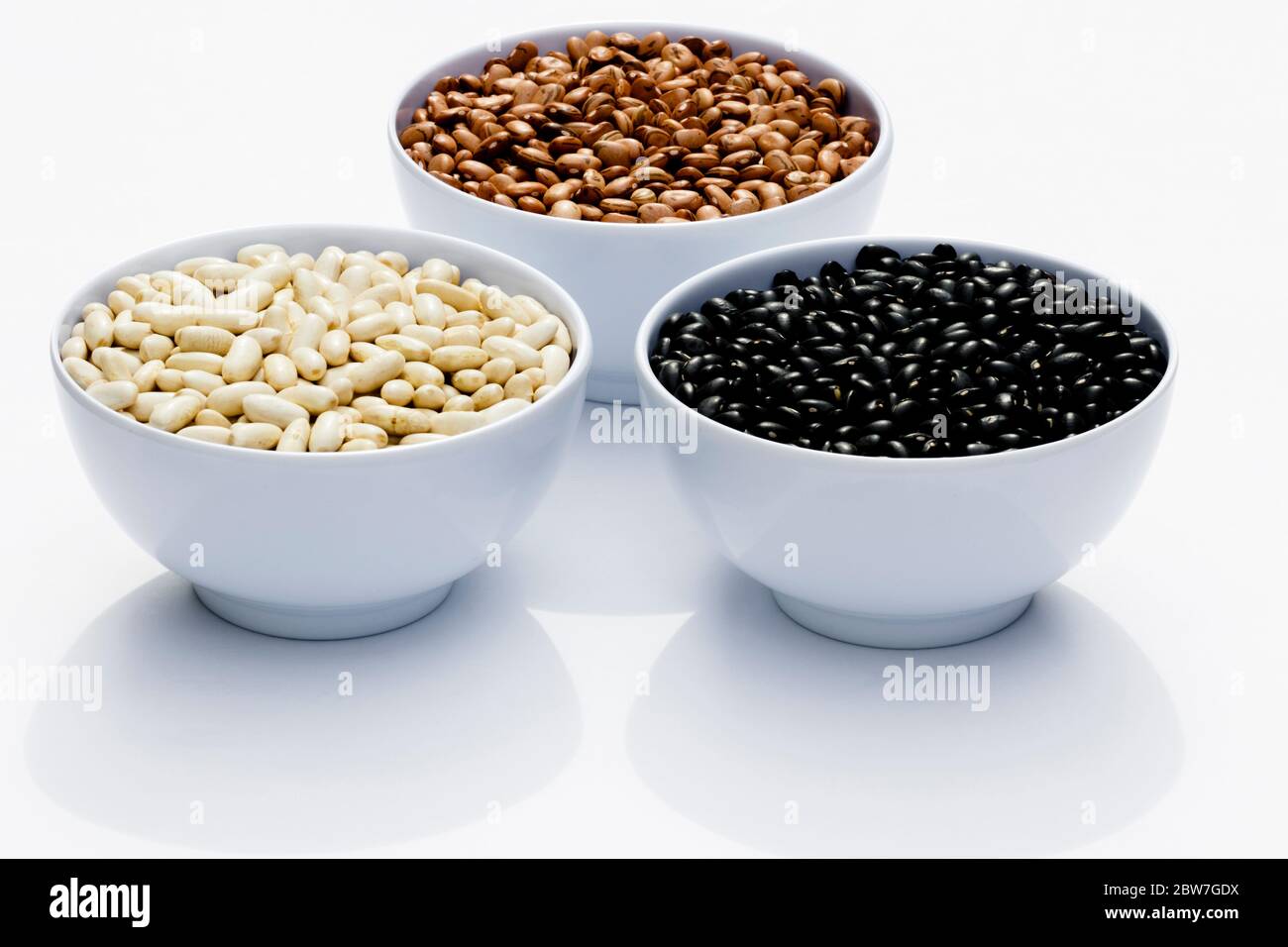 varieties of beans in bowls, white background Stock Photo - Alamy