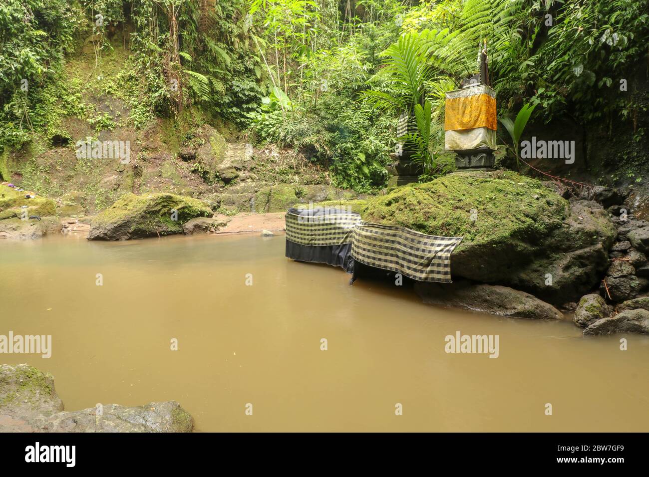 River and ancient hindu altar and Goa Giri temple in the forest Stock ...