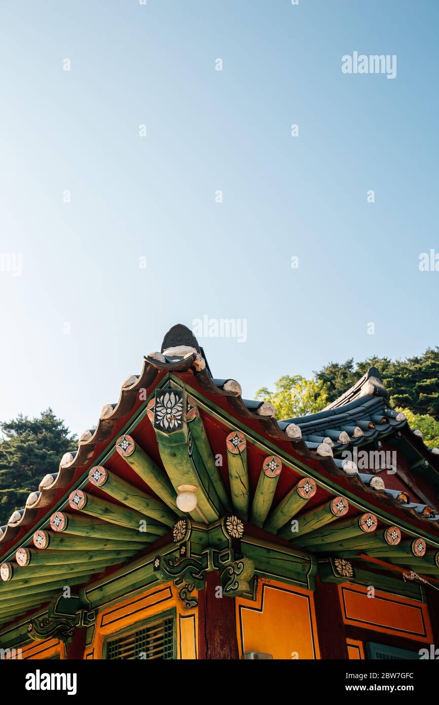 Korean traditional wooden roof eaves at Seoknamsa temple in Anseong ...