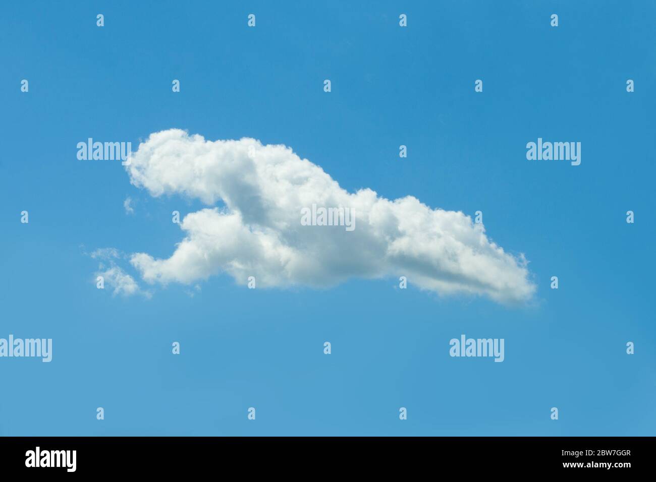 Blue sky background with one white cloud Stock Photo - Alamy