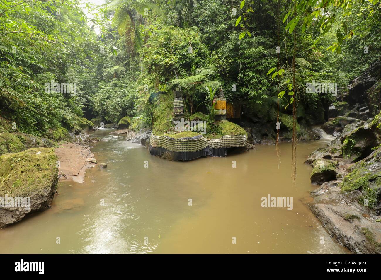 River and ancient hindu altar and Goa Giri temple in the forest Stock ...