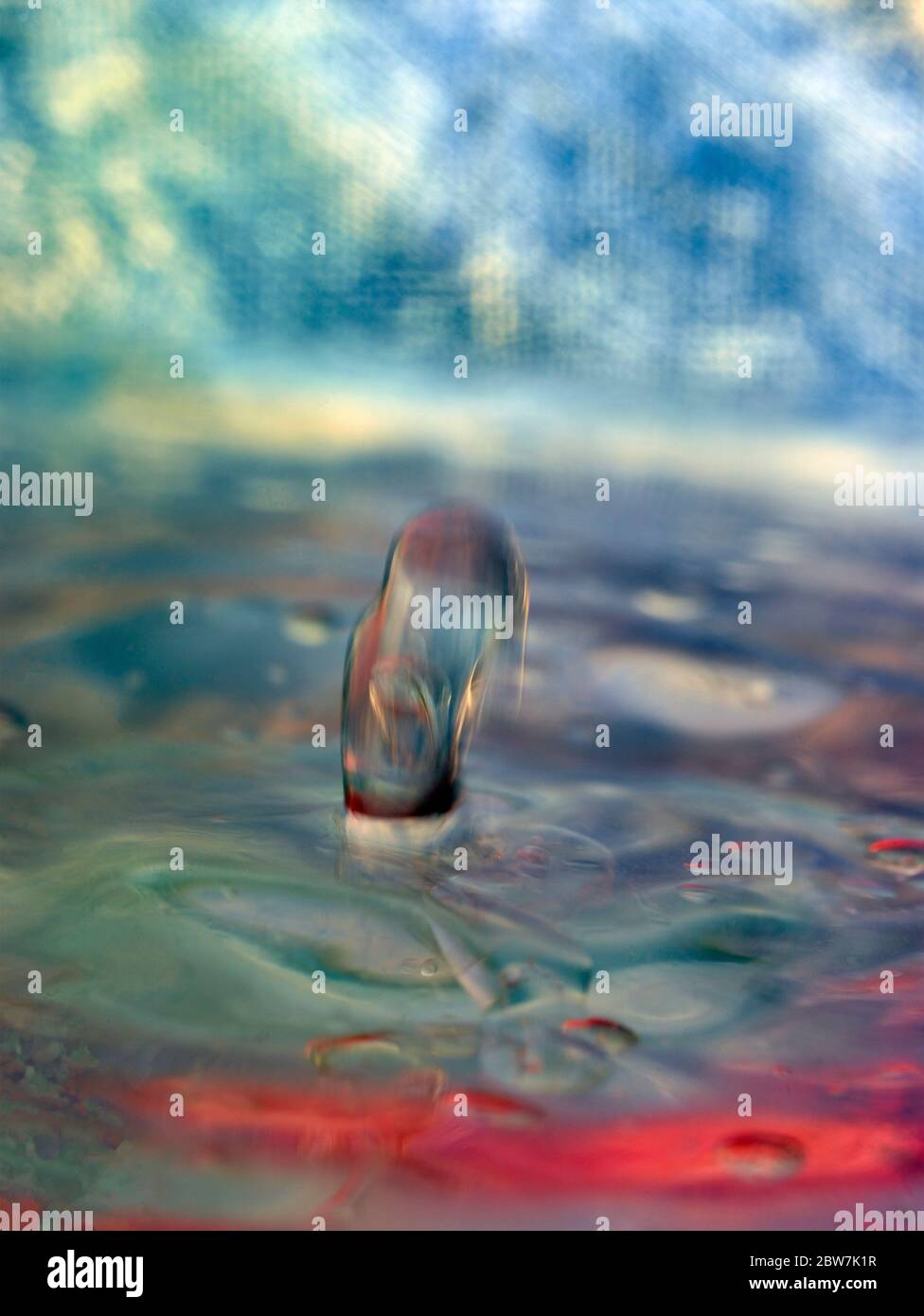 Droplets bouncing off water, close-up patterns in nature still-life ...