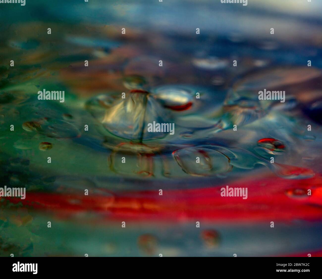 Droplets bouncing off water, close-up patterns in nature still-life ...