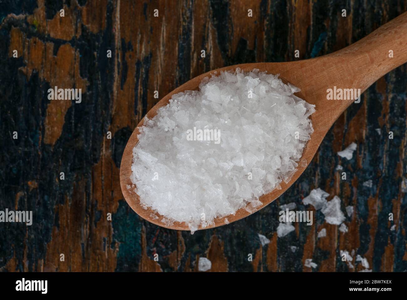 Sea Salt Flakes Spilled from a Teaspoon Stock Photo - Alamy