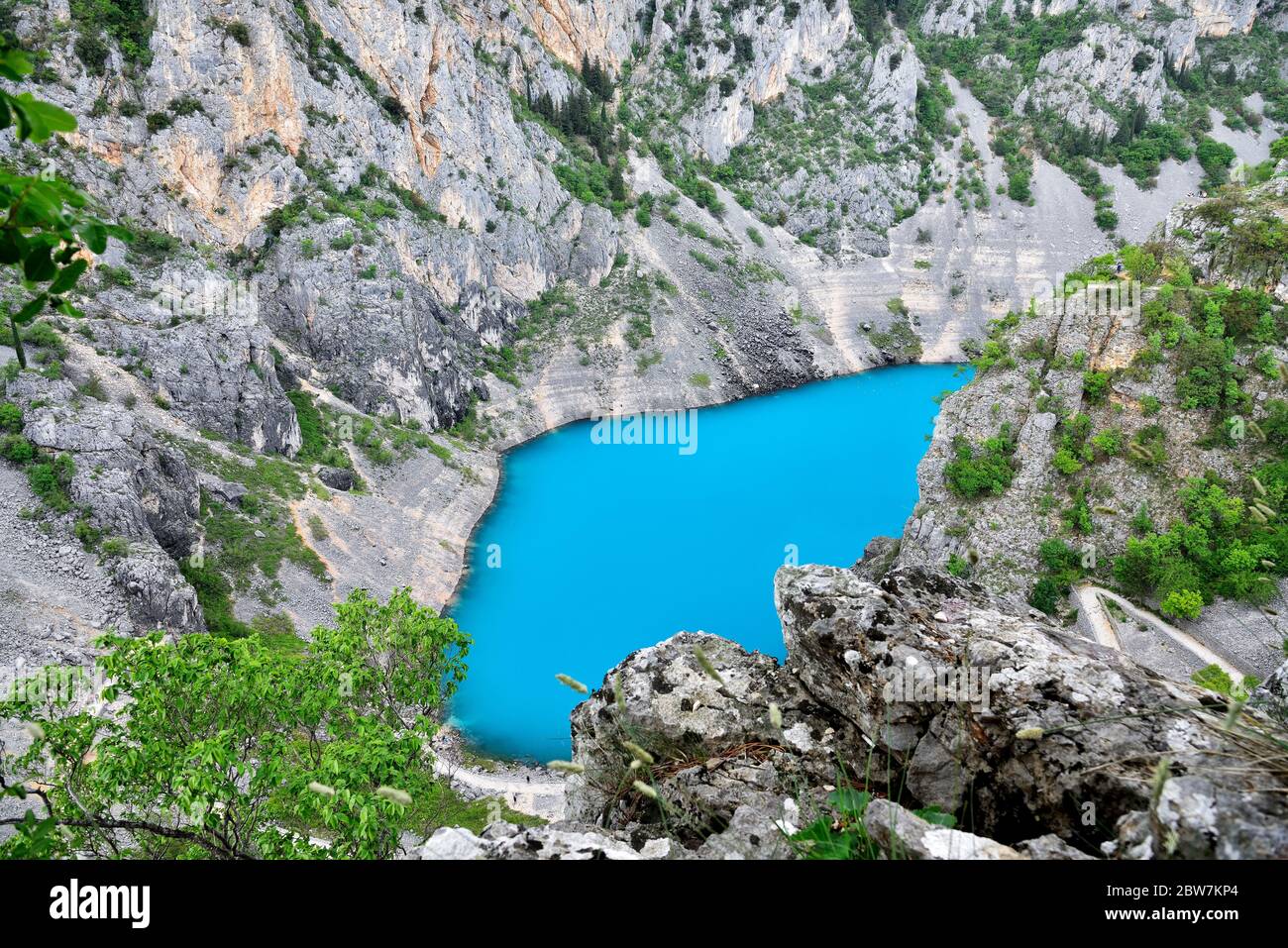 Blue lake (Modro Jezero) in the crater of an extinct volcano in Croatia ...