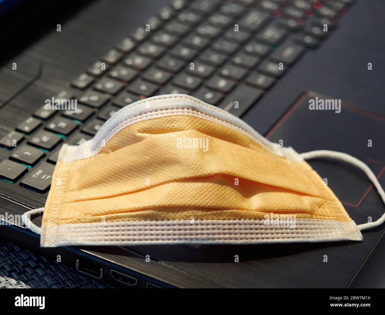 Laptop keyboard and mask hi-res stock photography and images - Alamy